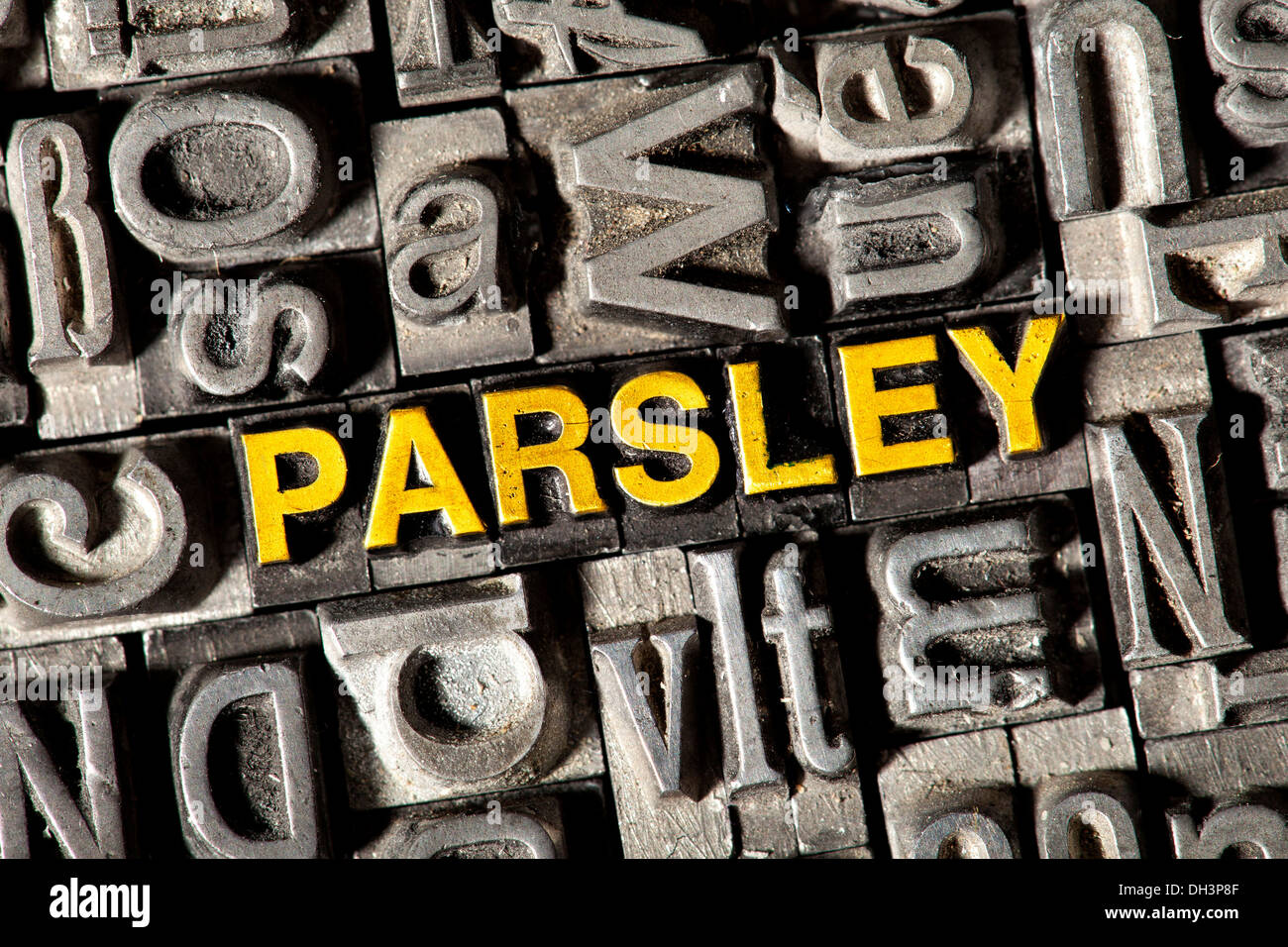 Old lead letters forming the word PARSLEY Stock Photo - Alamy