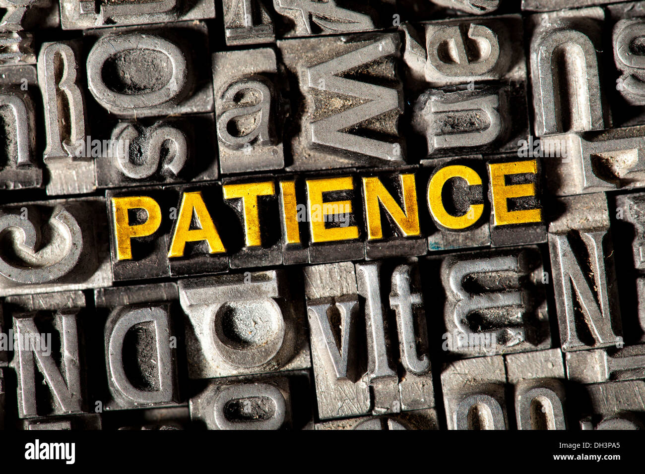 Old lead letters forming the word PATIENCE Stock Photo - Alamy
