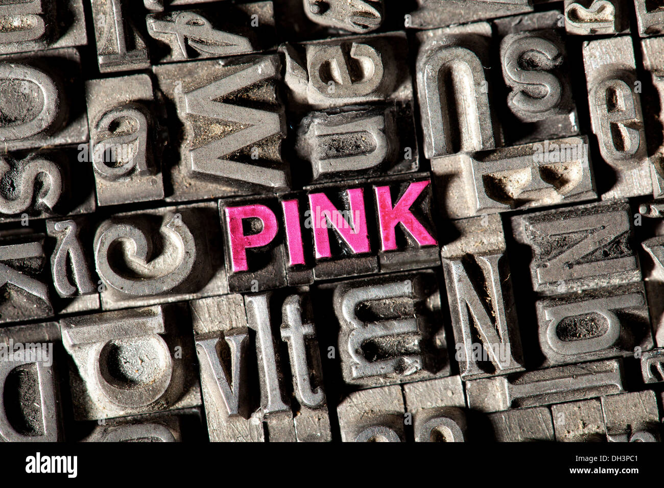 Old lead letters forming the word PINK in pink letters Stock Photo - Alamy