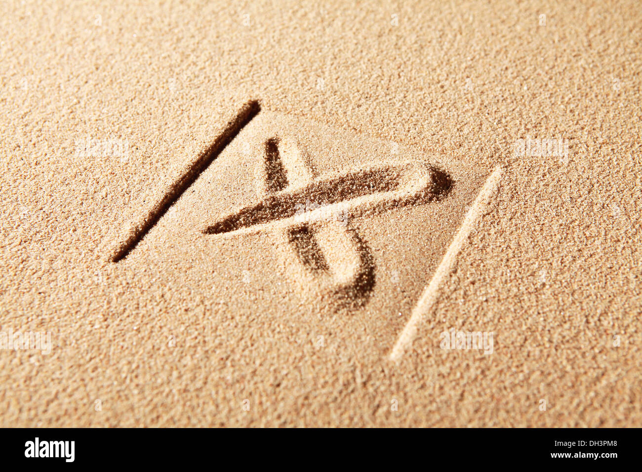 Box with a cross, drawn in sand Stock Photo - Alamy
