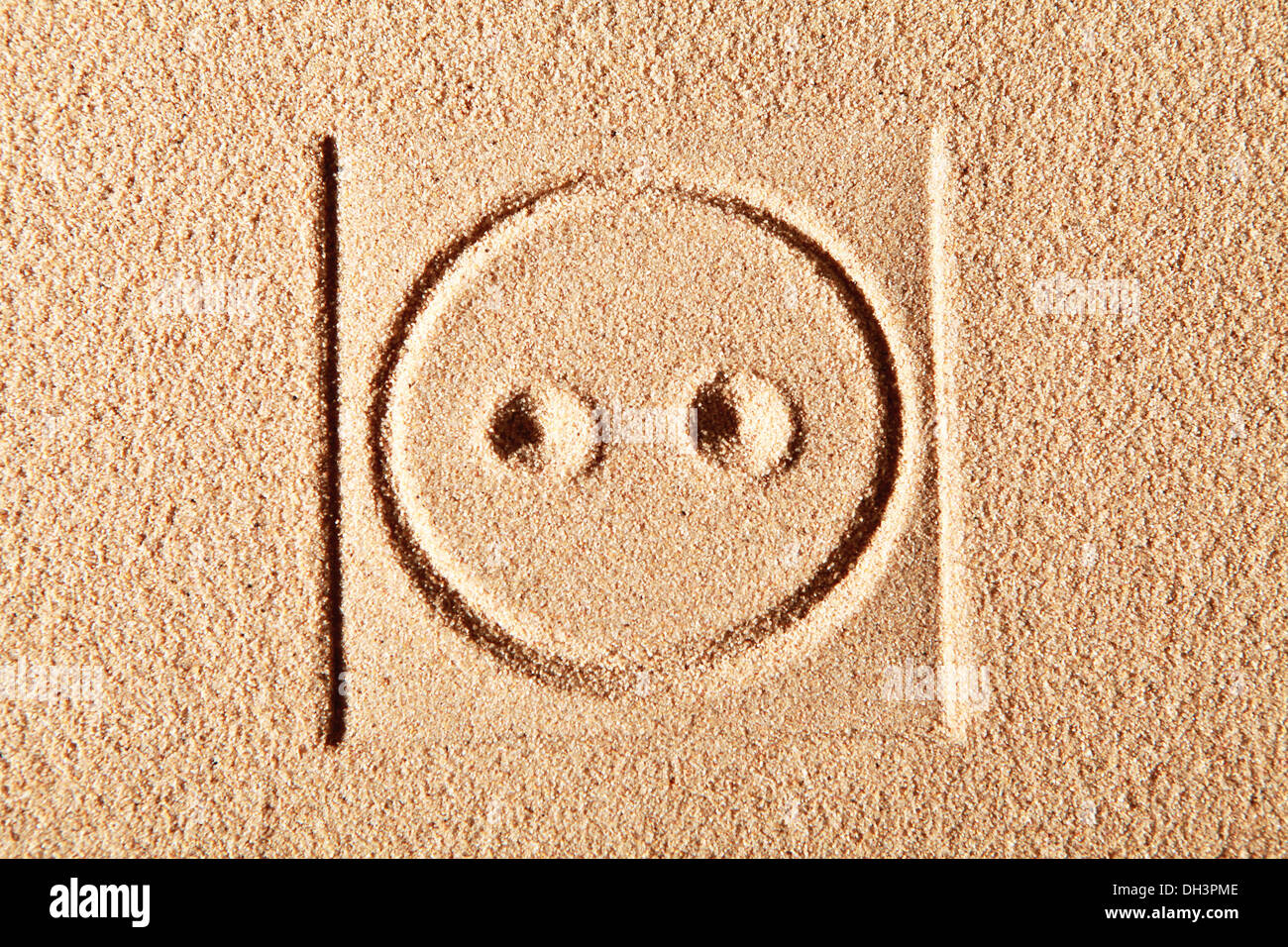 Power point symbol, drawn in sand Stock Photo - Alamy