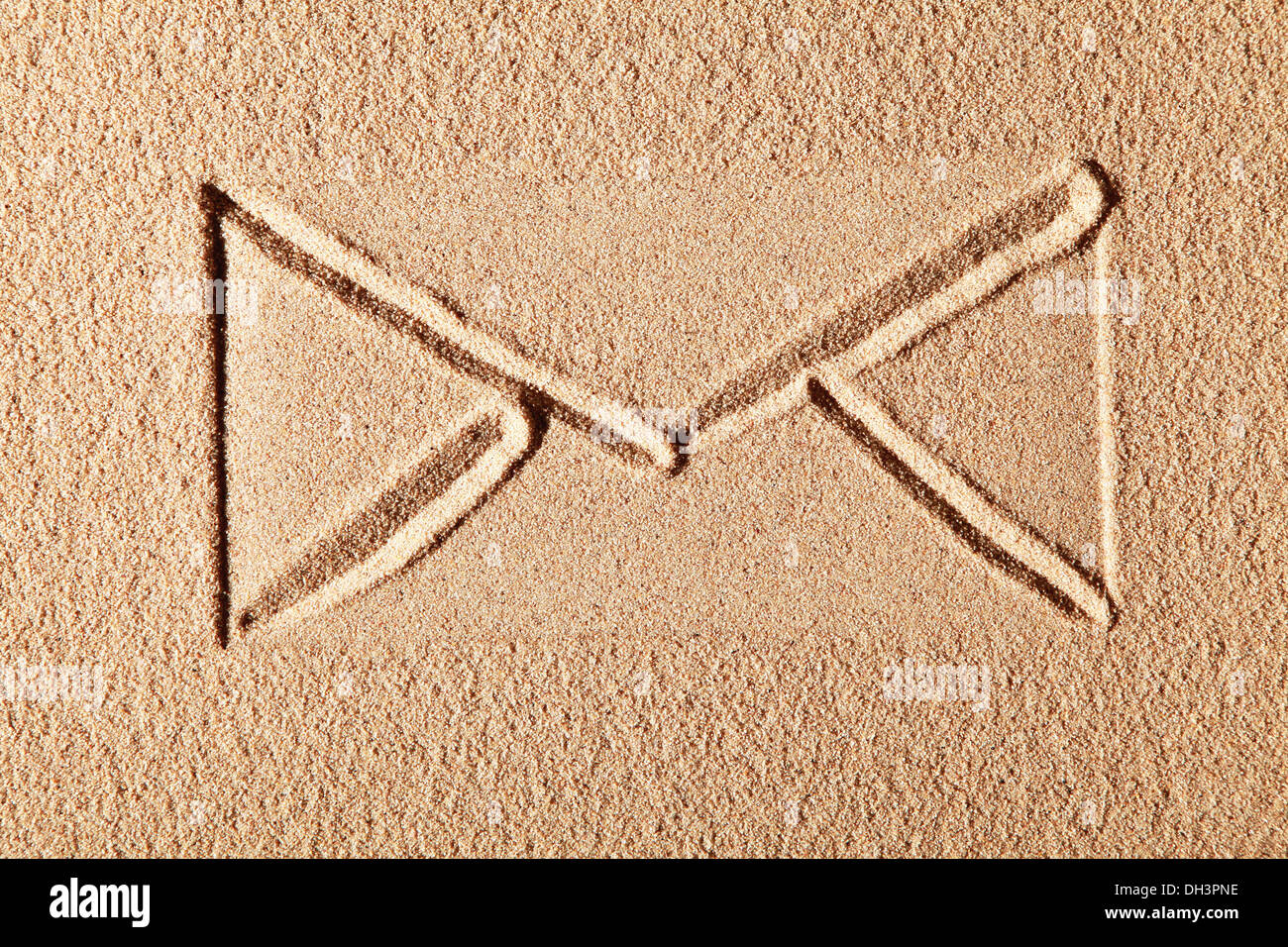 Envelope, drawn in sand Stock Photo - Alamy