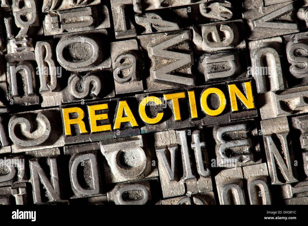 Old lead letters forming the word REACTION Stock Photo - Alamy