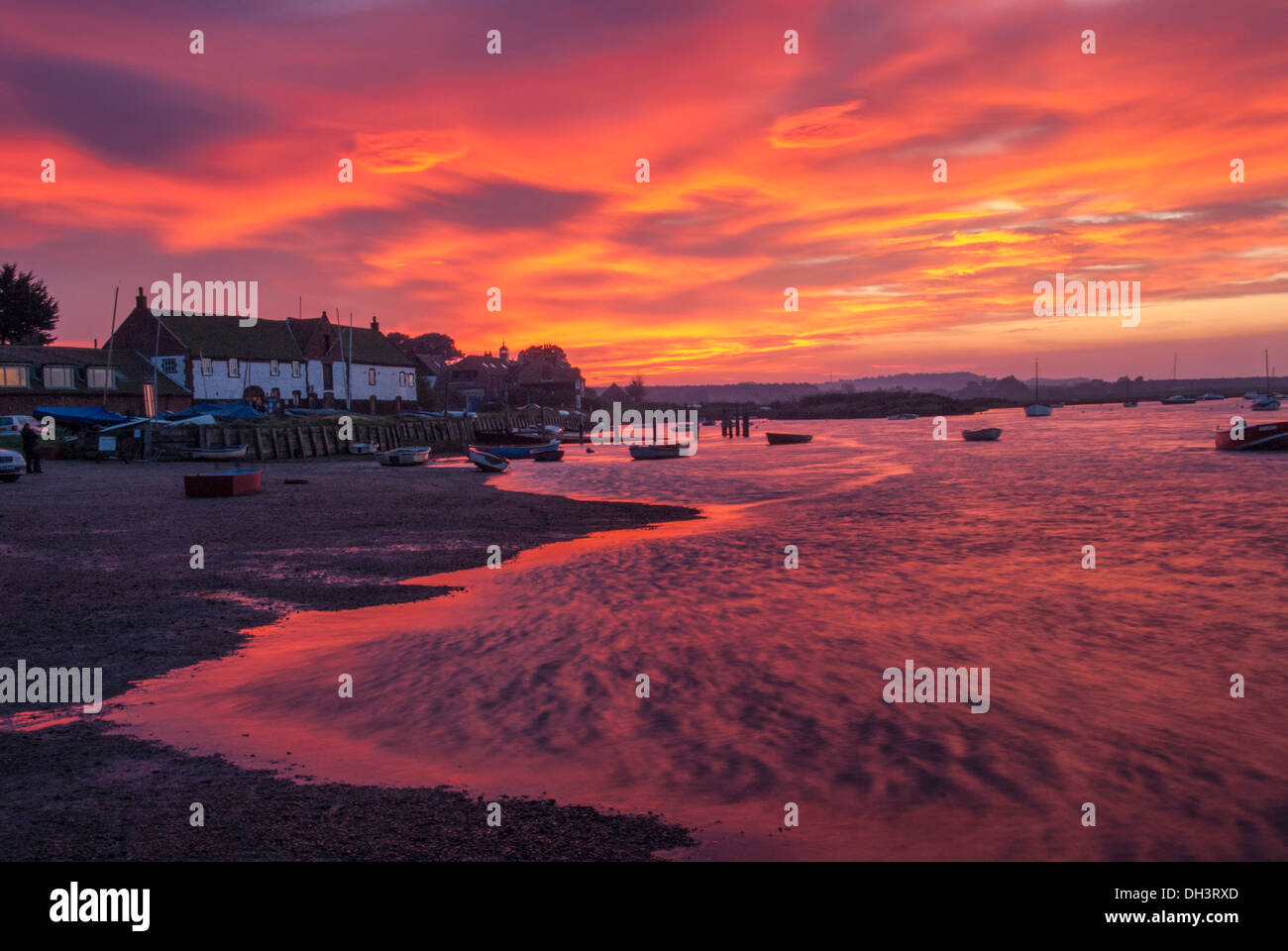 View of Burnham Overy Staite at sunset Stock Photo - Alamy