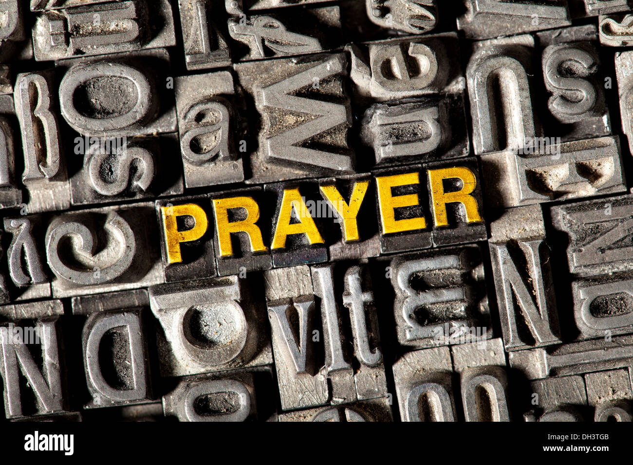 Old lead letters forming the word "PRAYER Stock Photo - Alamy