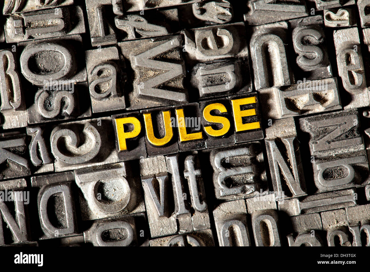 Old lead letters forming the word "PULSE Stock Photo - Alamy