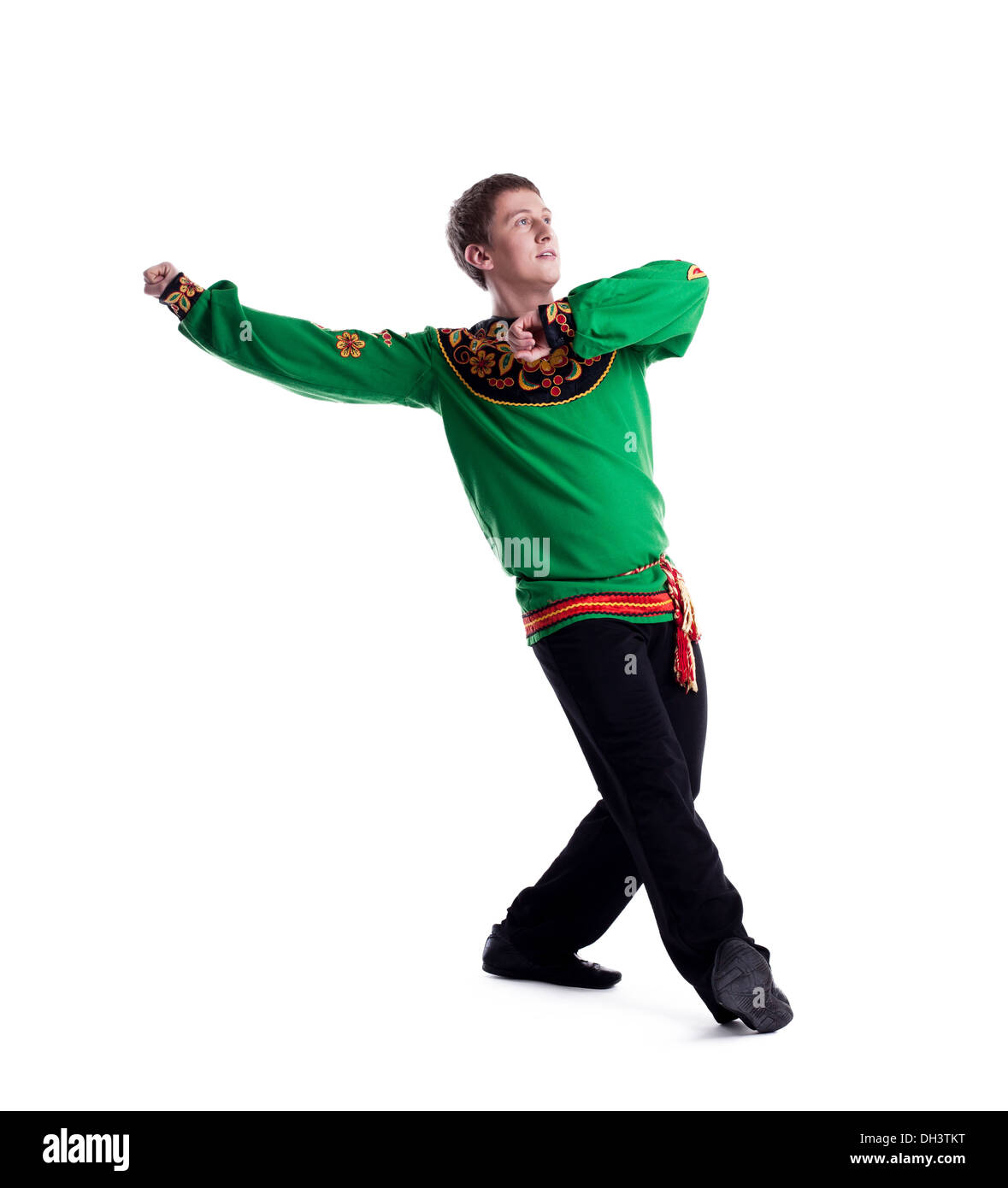 Handsome guy performing folk dance Stock Photo - Alamy