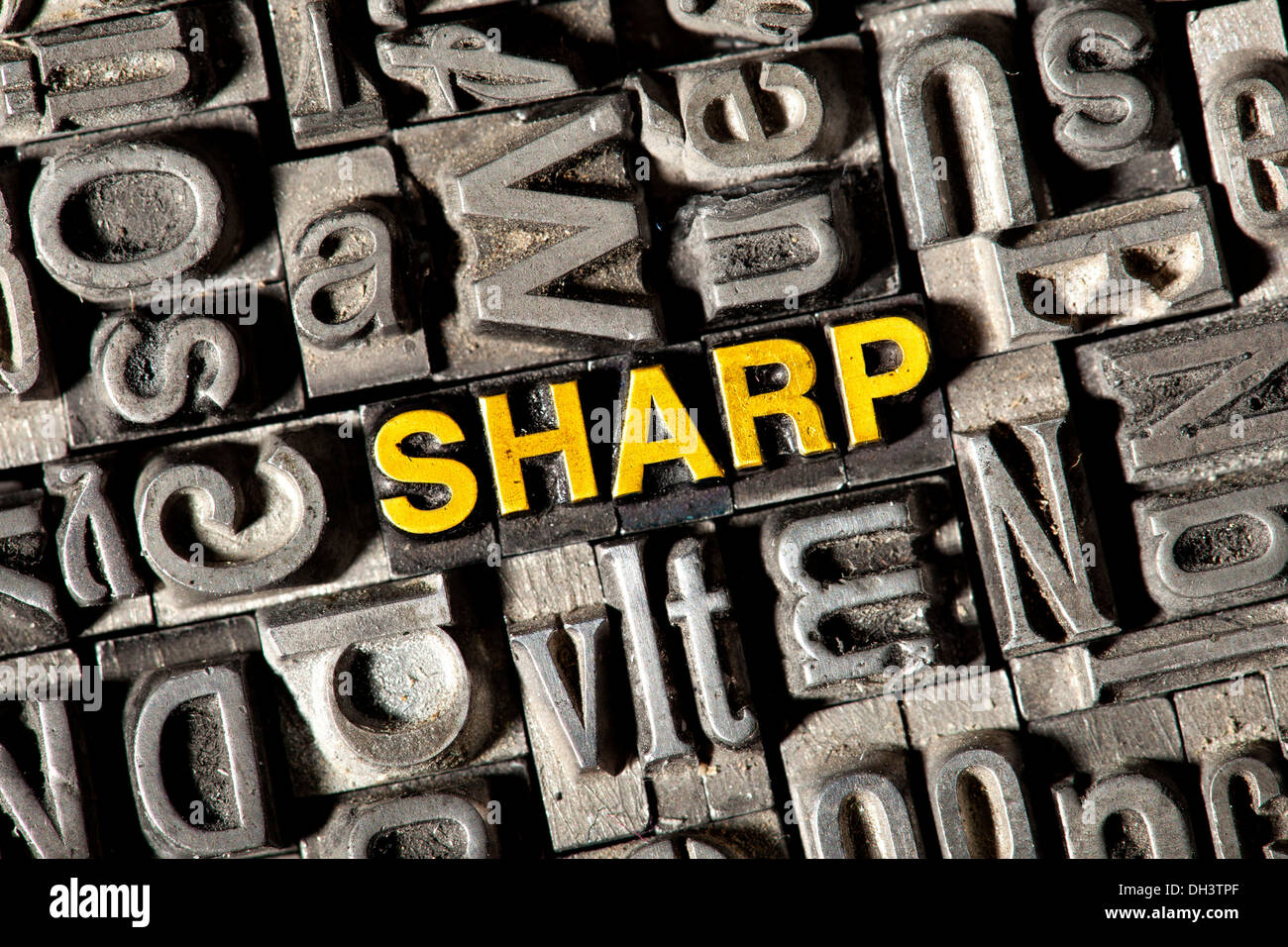 Old lead letters forming the word "SHARP Stock Photo - Alamy