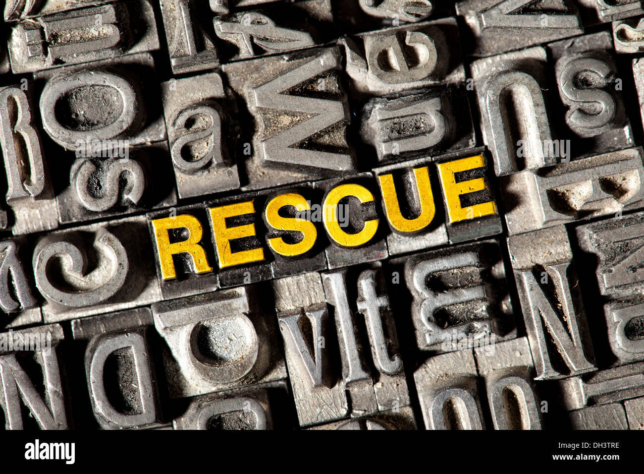 Old lead letters forming the word "RESCUE Stock Photo - Alamy