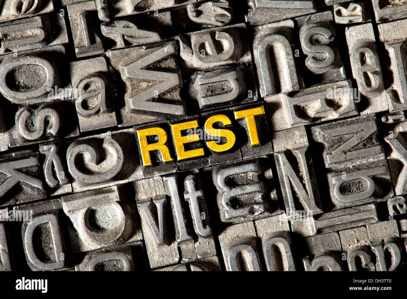 Old lead letters forming the word "REST Stock Photo - Alamy