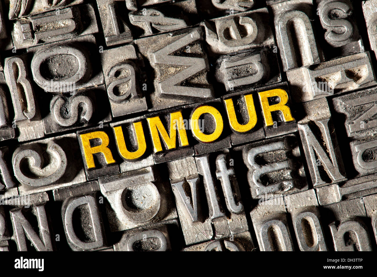Old lead letters forming the word "RUMOUR Stock Photo - Alamy