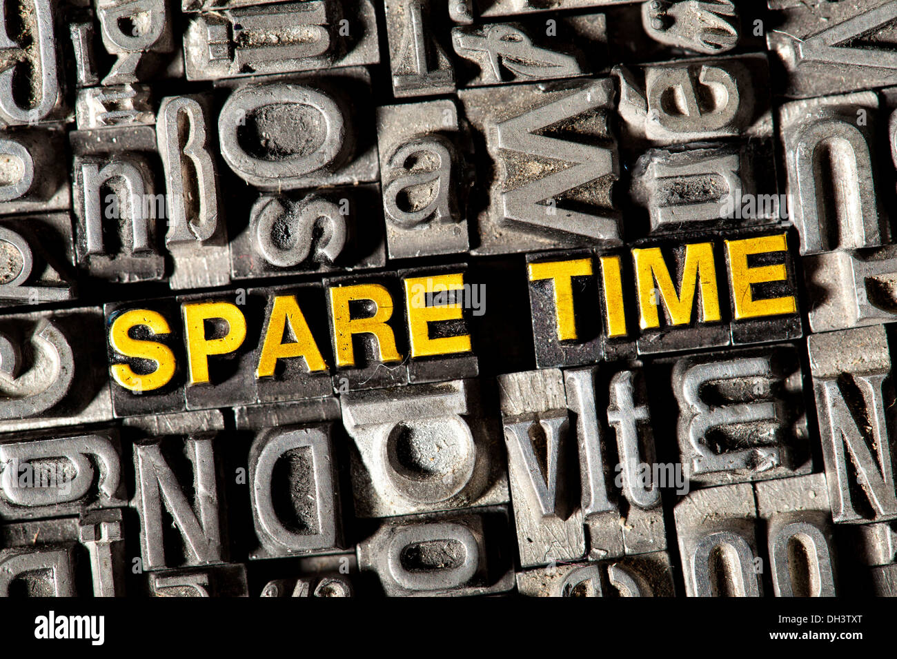 Old lead letters forming the words "SPARE TIME Stock Photo - Alamy