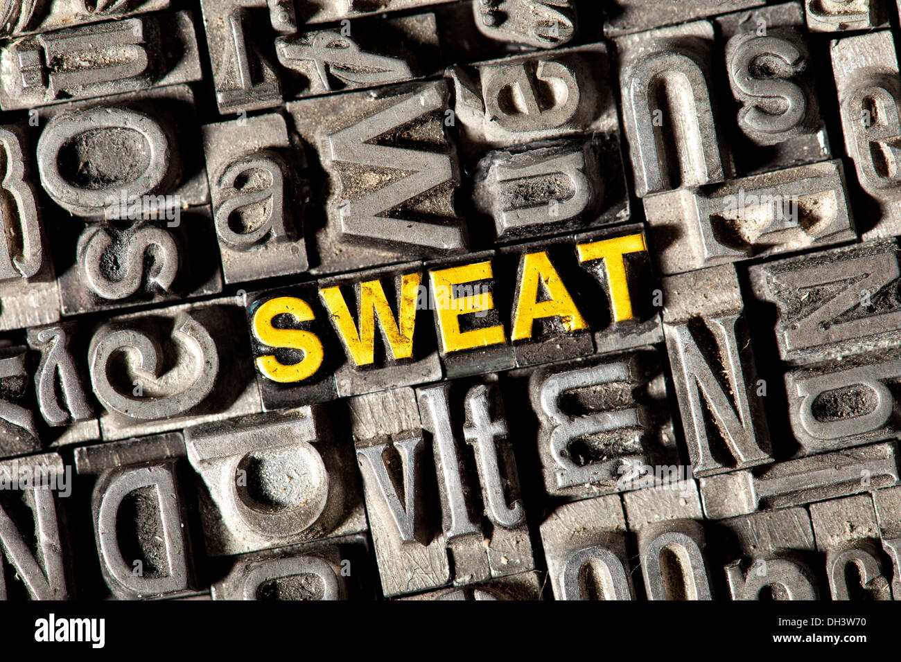 Old lead letters forming the word "SWEAT Stock Photo - Alamy