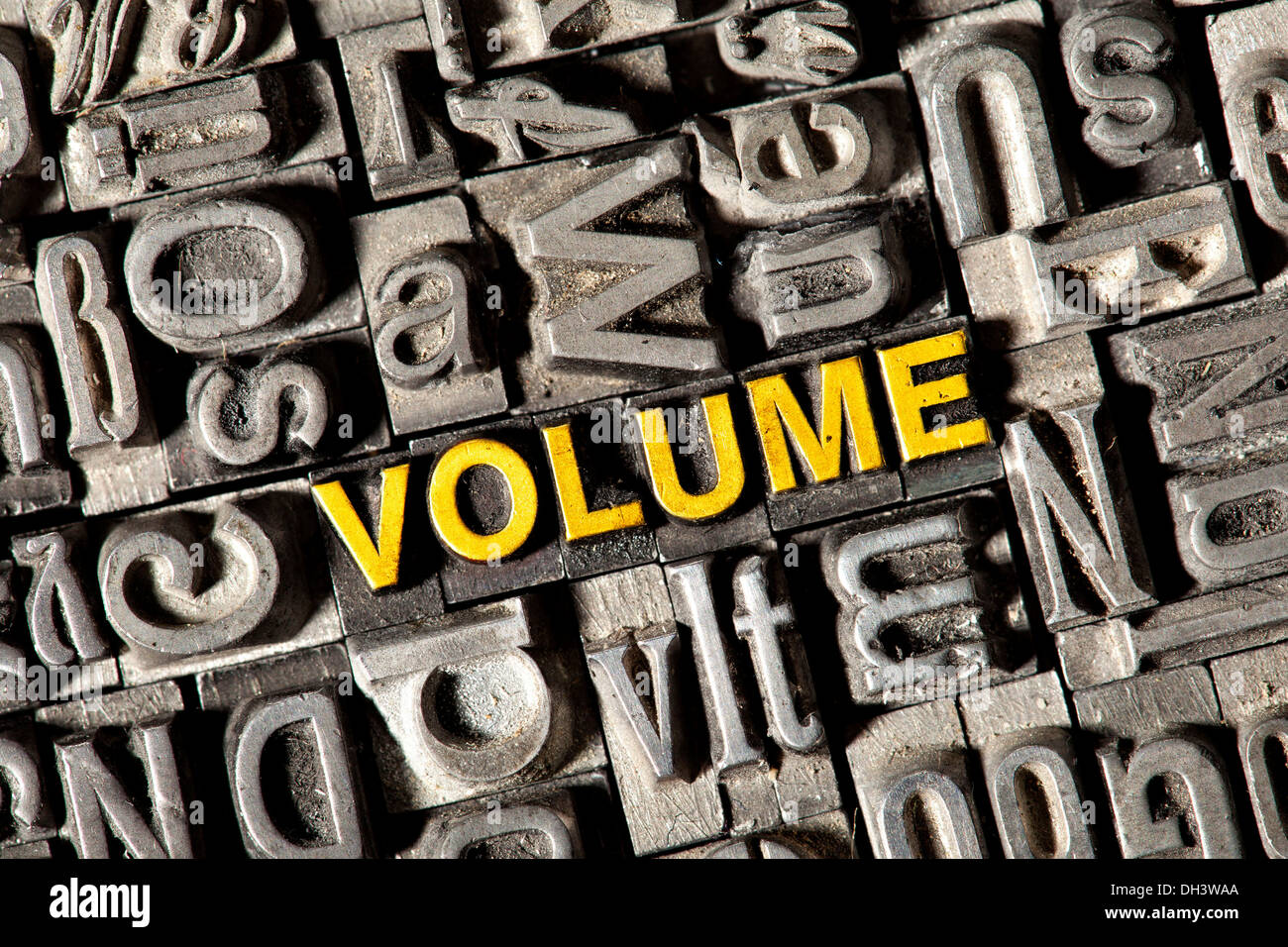 Old lead letters forming the word Volume Stock Photo - Alamy