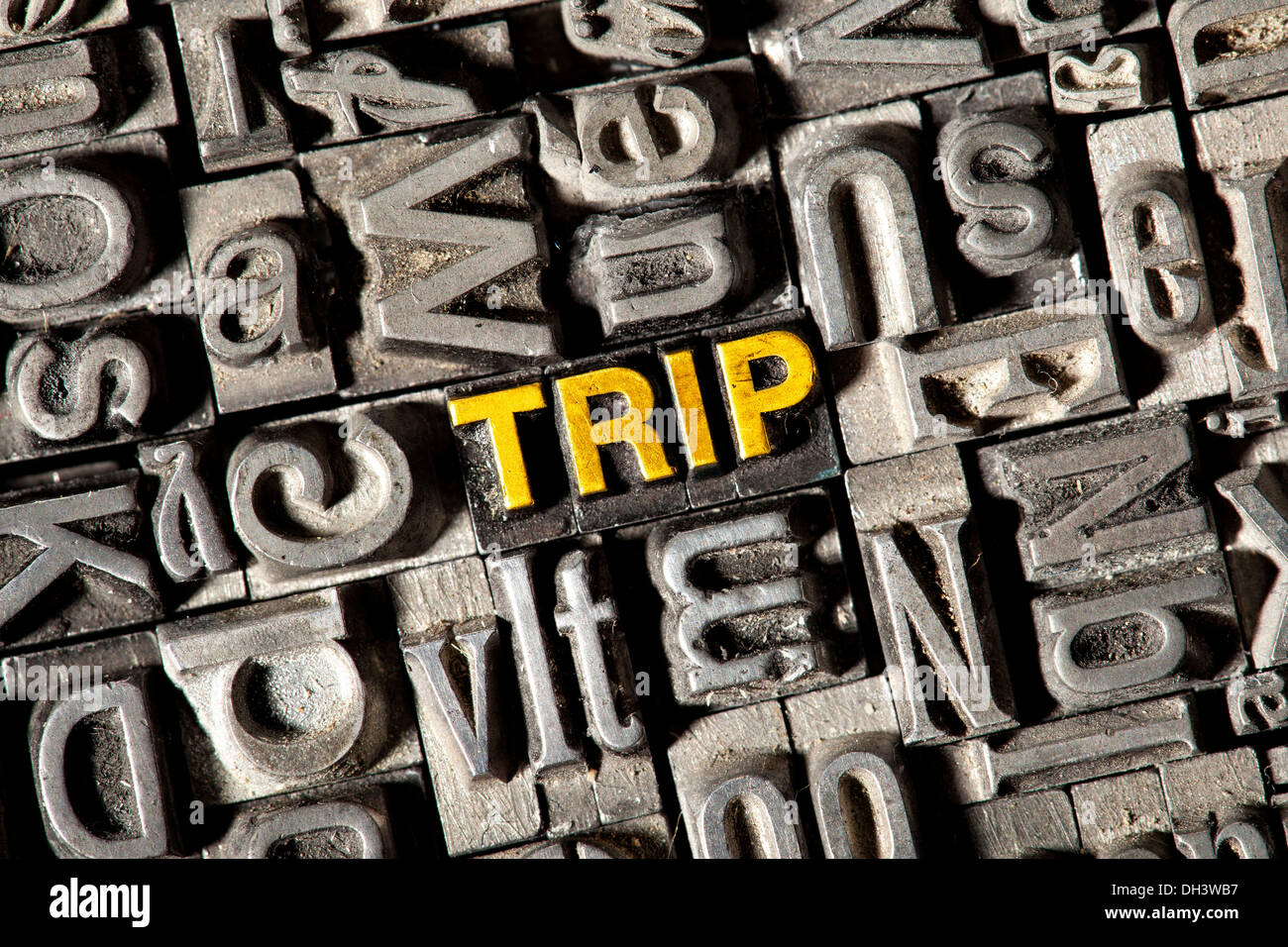 Old lead letters forming the word Trip Stock Photo - Alamy