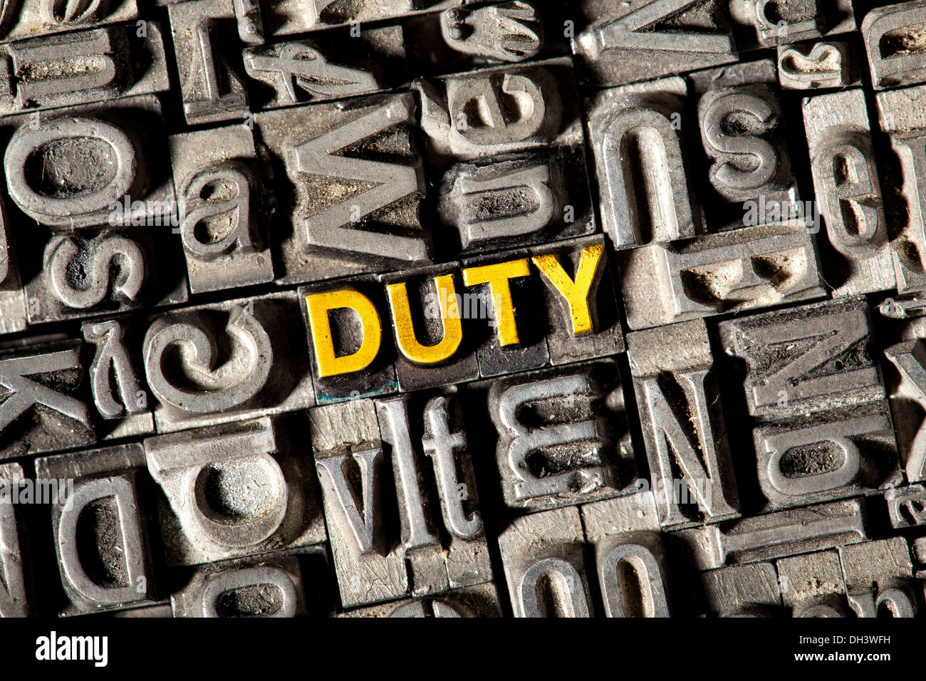 Old lead letters forming the word Duty Stock Photo - Alamy