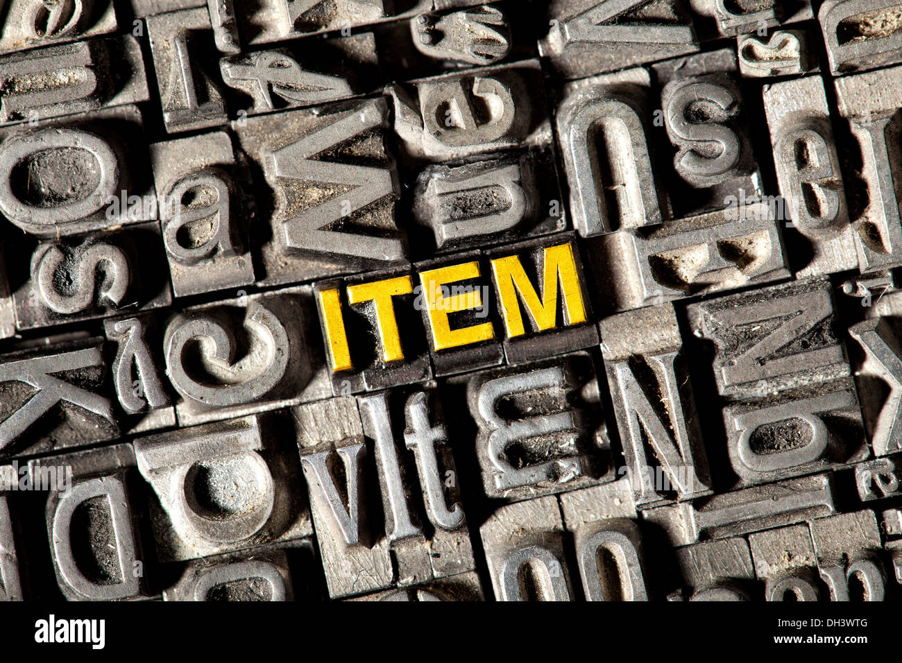 Old lead letters forming the word Item Stock Photo - Alamy