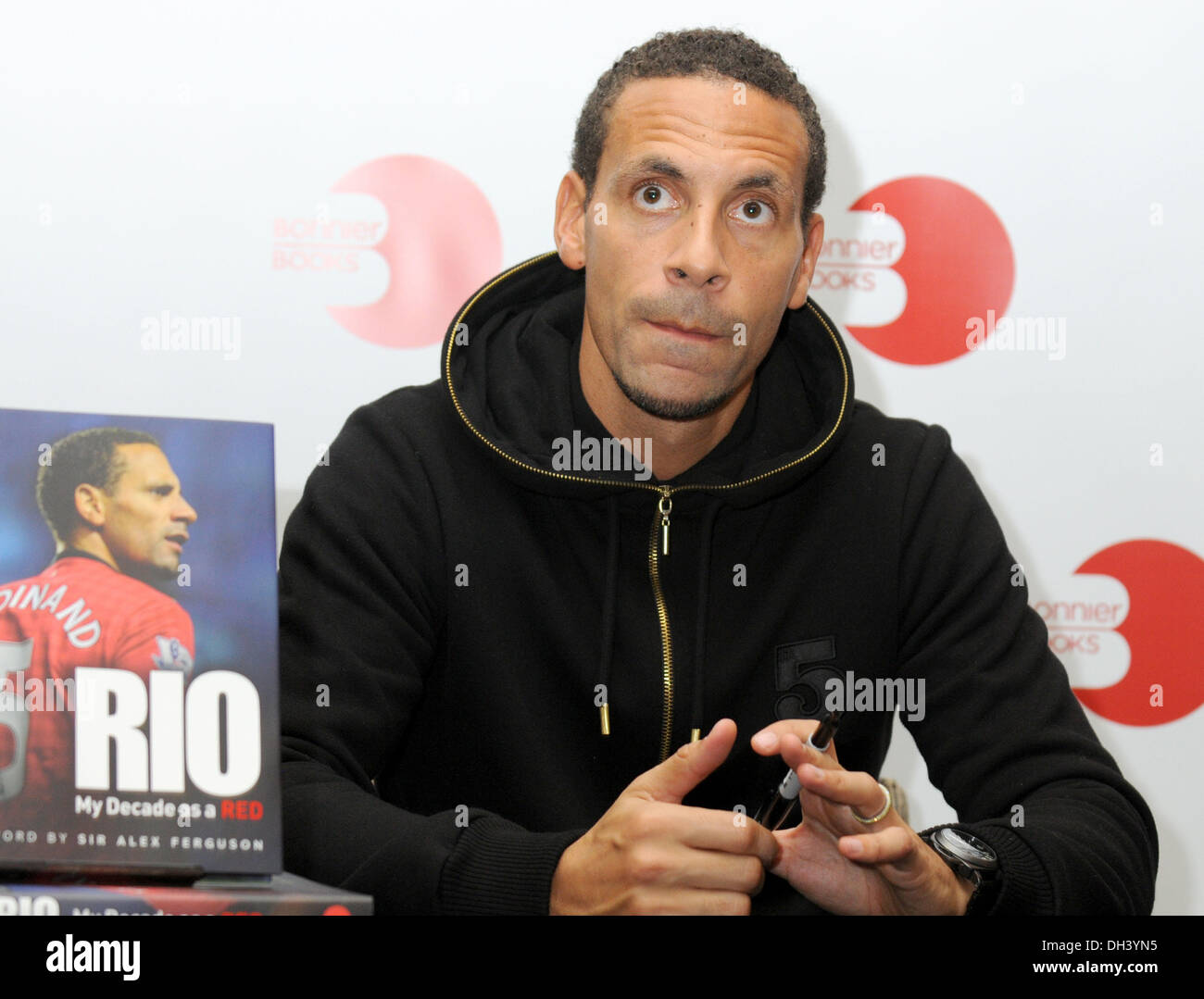 London, UK . 30th Oct, 2013. Rio Ferdinand signing his book 'Rio: My ...