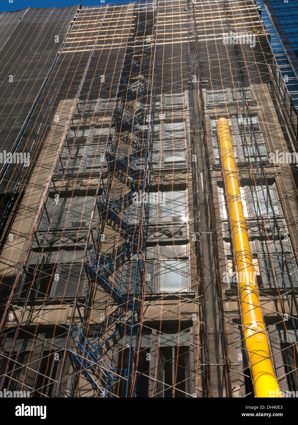Demolition Chute at Building Construction Site in NYC Stock Photo - Alamy