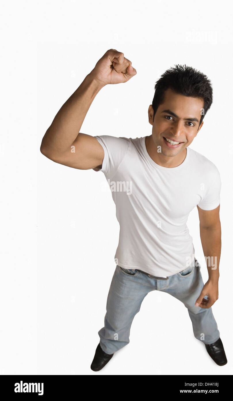 Young man excited success winning Cut Out Stock Images & Pictures - Alamy