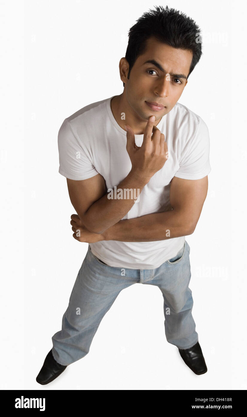 Man hand on chin thinking Cut Out Stock Images & Pictures - Alamy