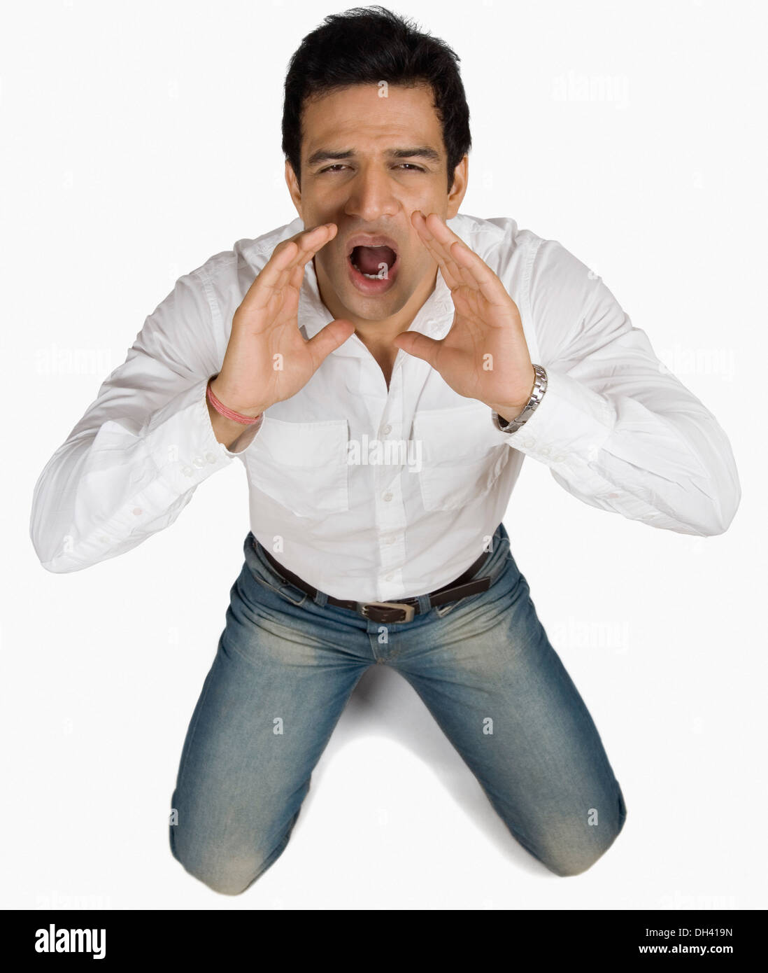 Portrait of a young man shouting Stock Photo - Alamy
