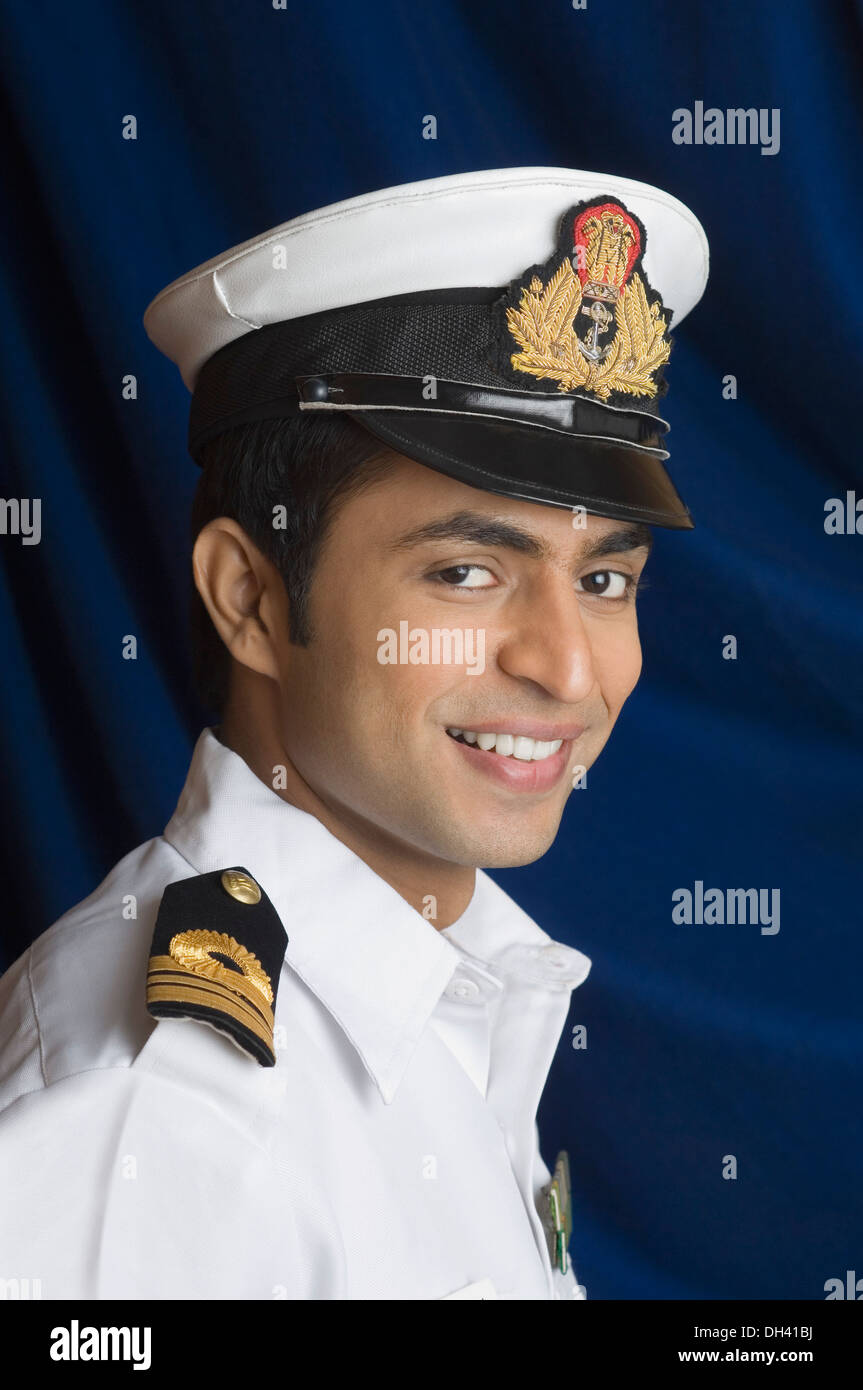Portrait of a navy officer smiling Stock Photo - Alamy