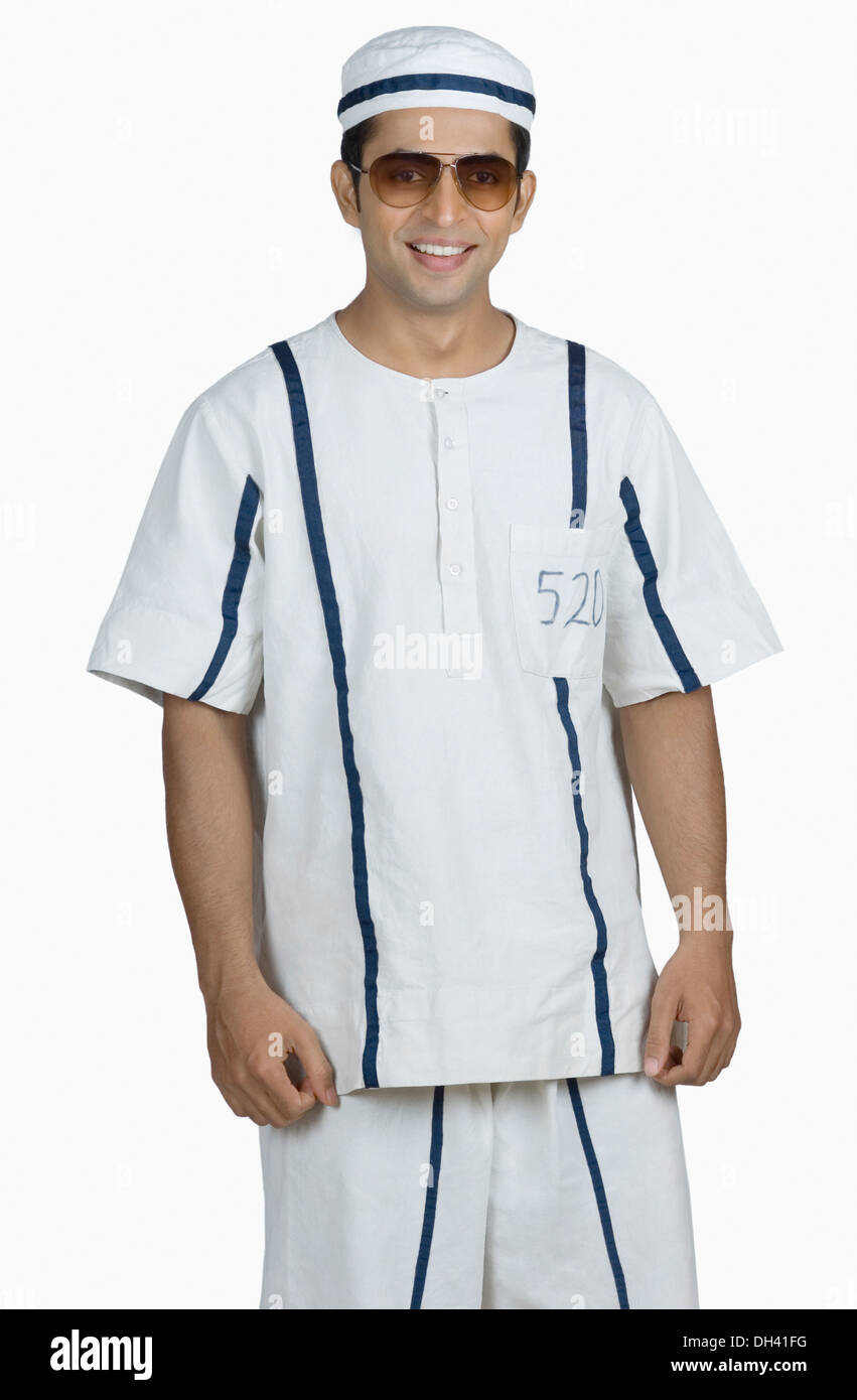 Prisoner wearing sunglasses and smiling Stock Photo - Alamy
