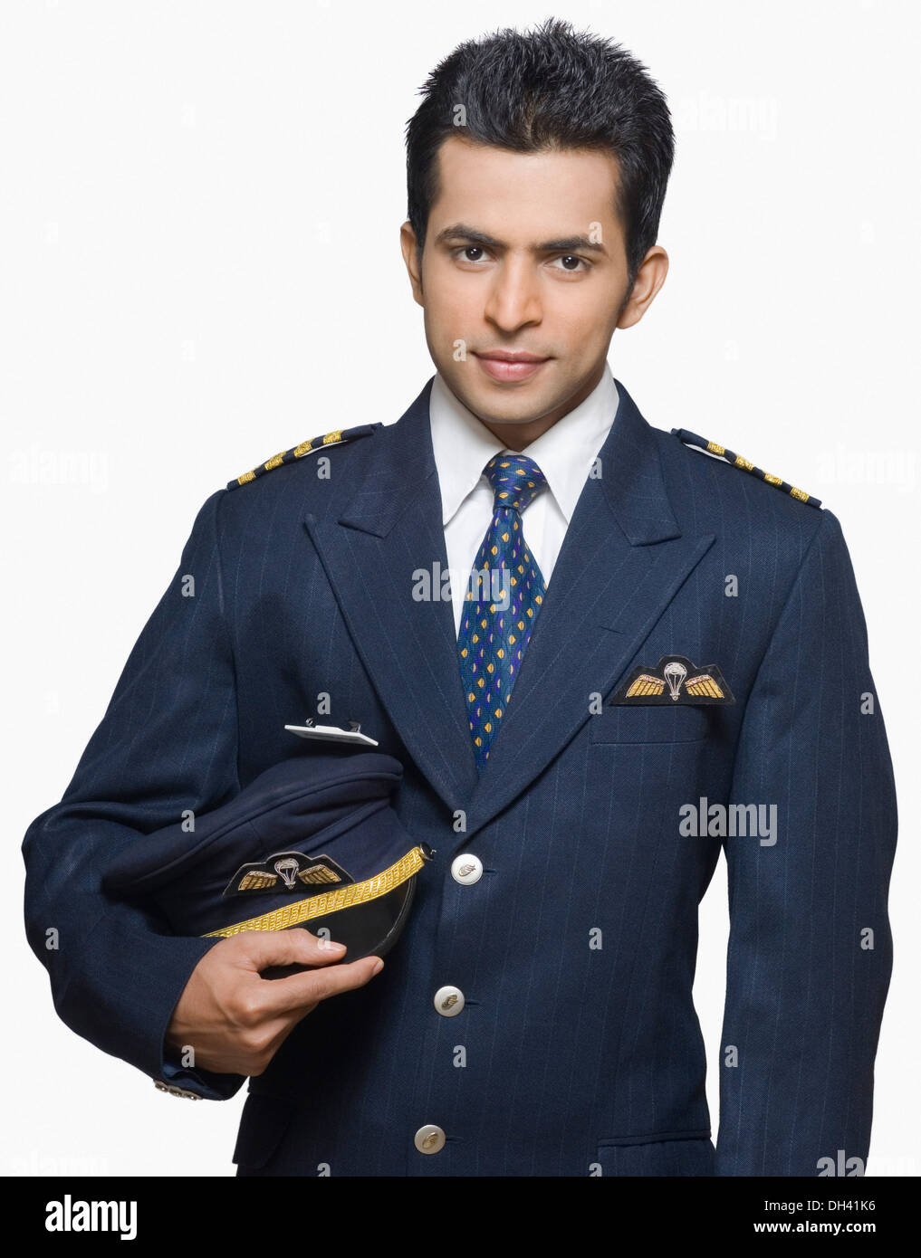 Portrait pilot holding uniform cap hi-res stock photography and images ...