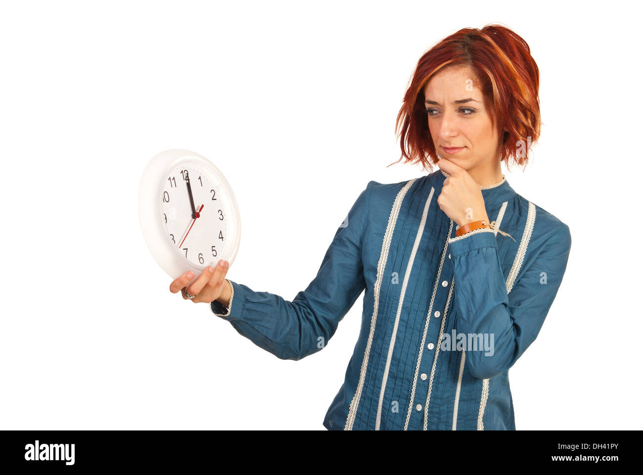 Executive woman with asking face looking to clock isolated on white ...
