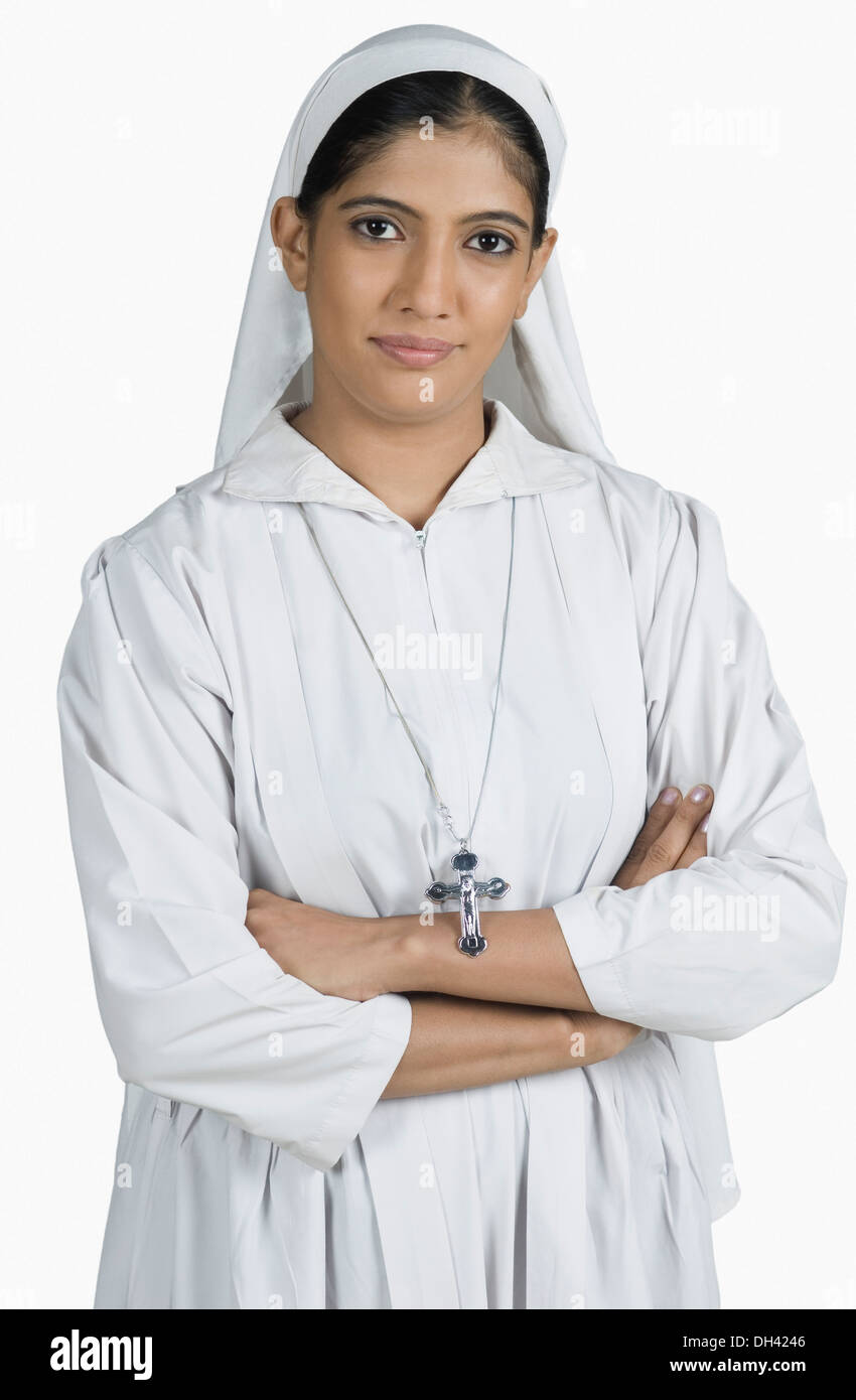 Portrait nun standing arms hi-res stock photography and images - Alamy