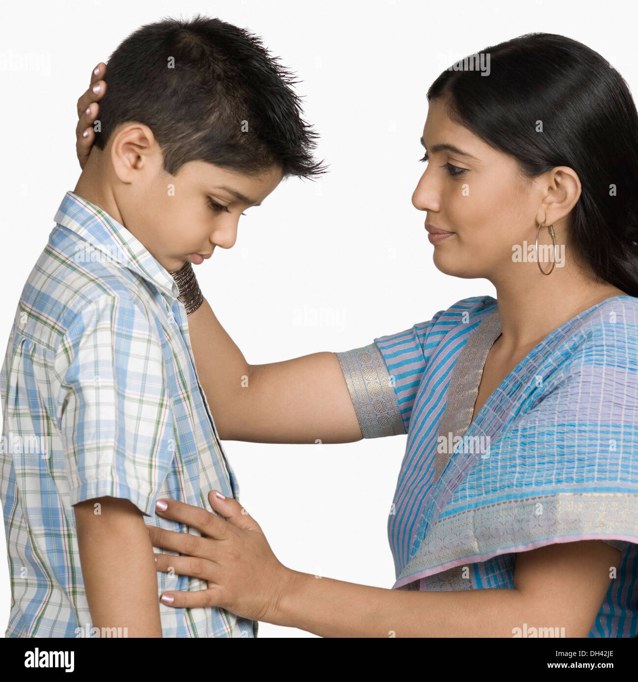 Caring mother consoling her adult son hi-res stock photography and ...