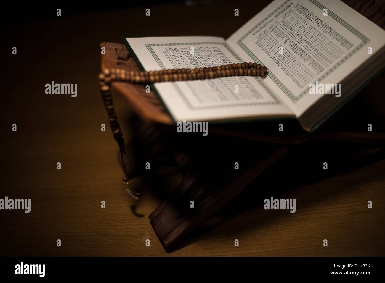 pages of holy koran and rosary at the book Stock Photo - Alamy