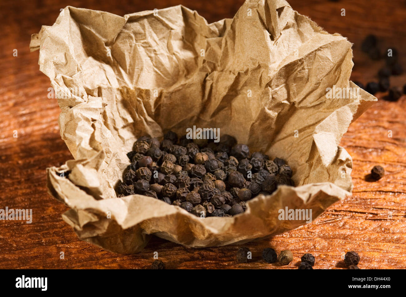 Black peppercorns in a paper Stock Photo - Alamy