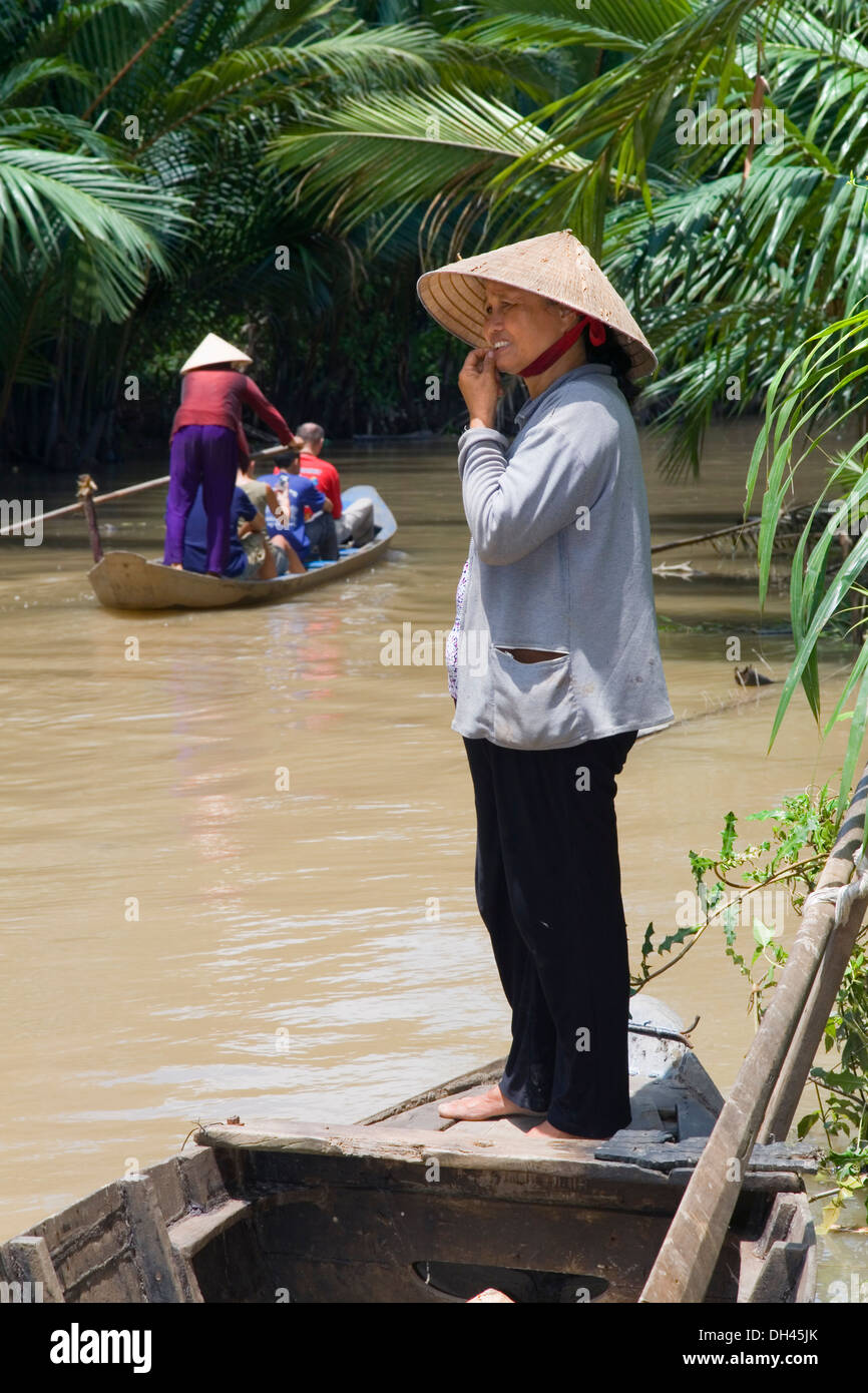 woman in a boat. Mekong delta, Vietnam, Asia Stock Photo - Alamy