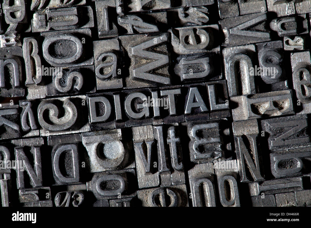 Old lead letters forming the word DIGITAL Stock Photo - Alamy