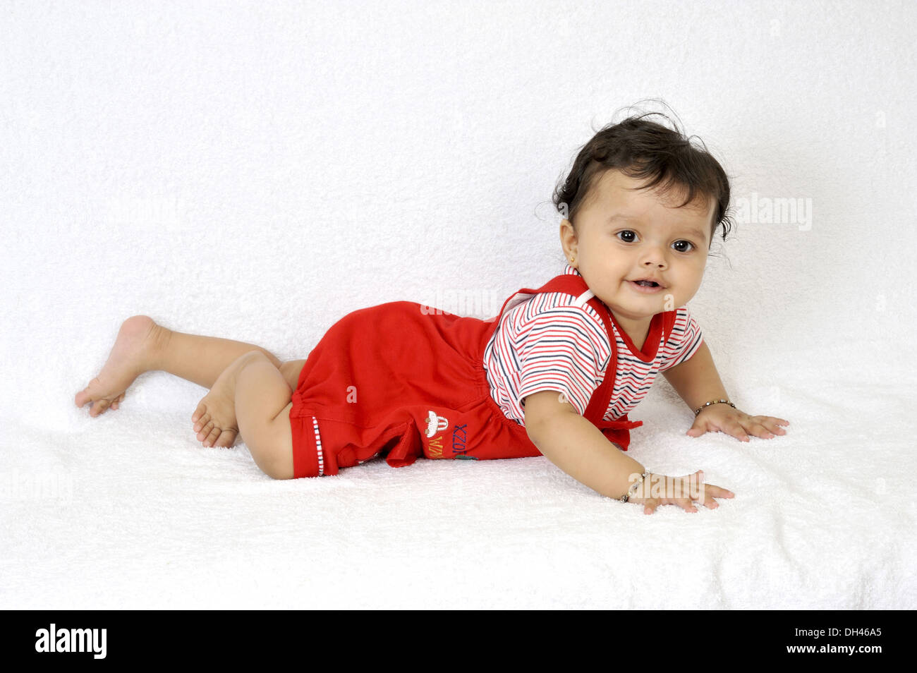 Indian baby crawling hi-res stock photography and images - Alamy
