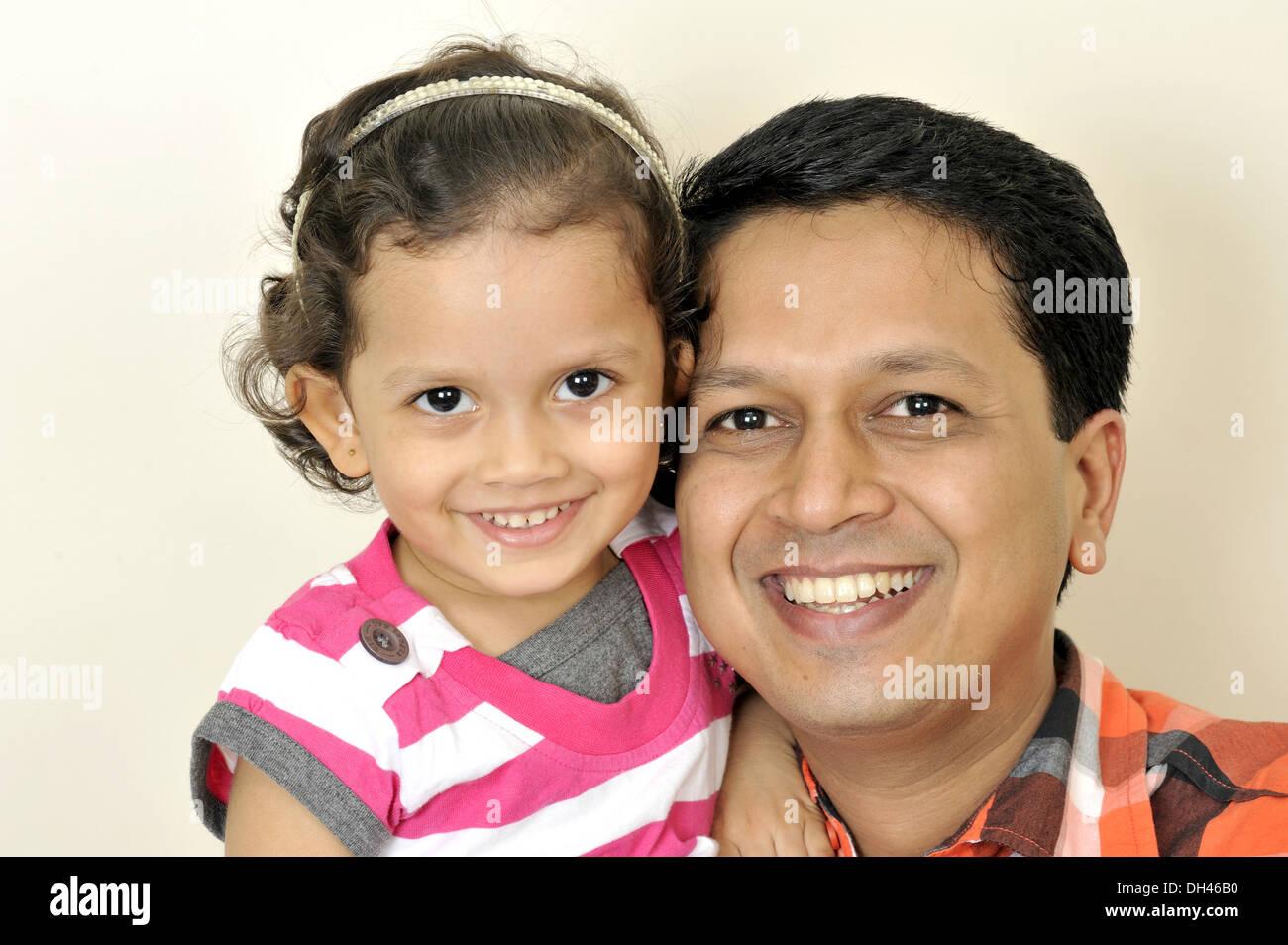 Indian man father with baby girl child daughter portrait happy white ...