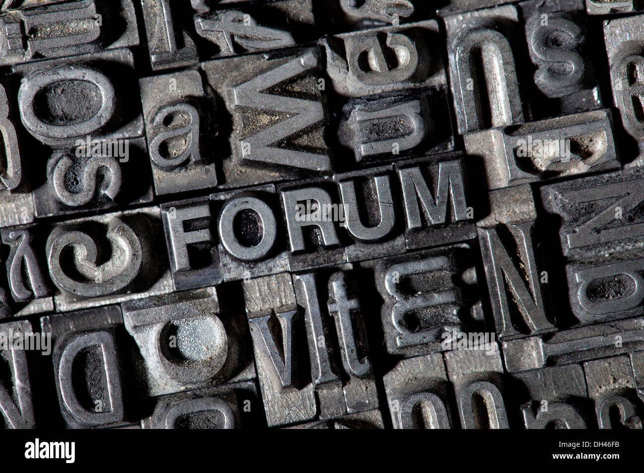 Old lead letters forming the word FORUM Stock Photo - Alamy