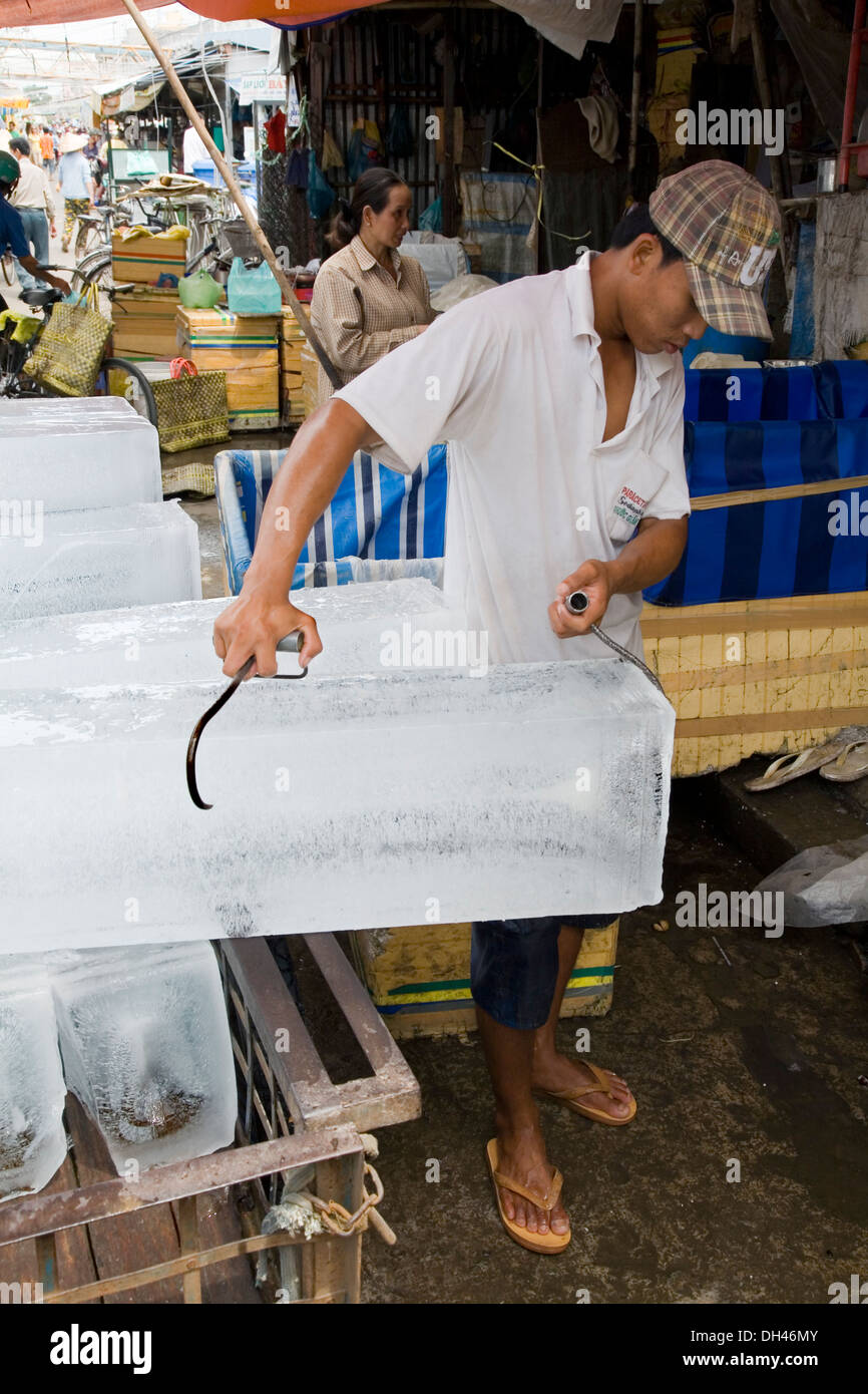 ice block transport on a food street market. Can Tho city. Mekong Delta ...