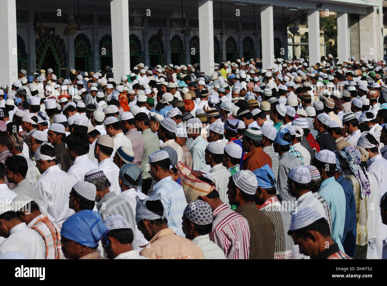 Muslims crowd praying people offering Namaz on the occasion of Eid ...