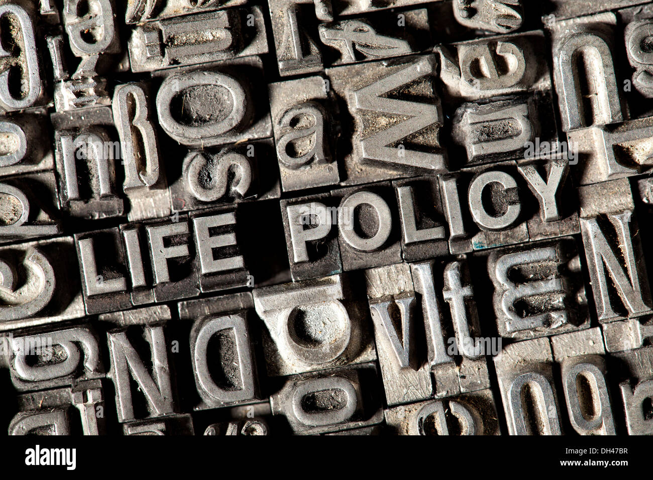 Old lead letters forming the words "LIFE POLICY Stock Photo - Alamy