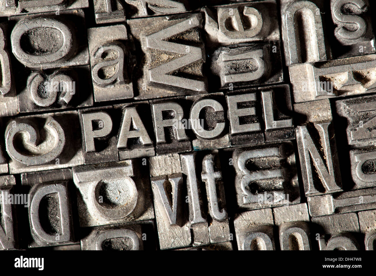 Old lead letters forming the word "PARCEL" Stock Photo - Alamy