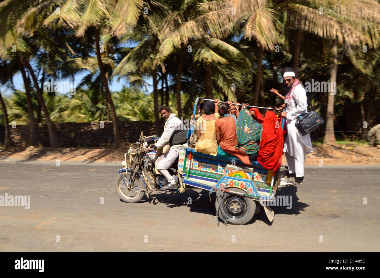 Man driving crowded auto rickshaw taxi Porbandar Gujrat India Asia ...