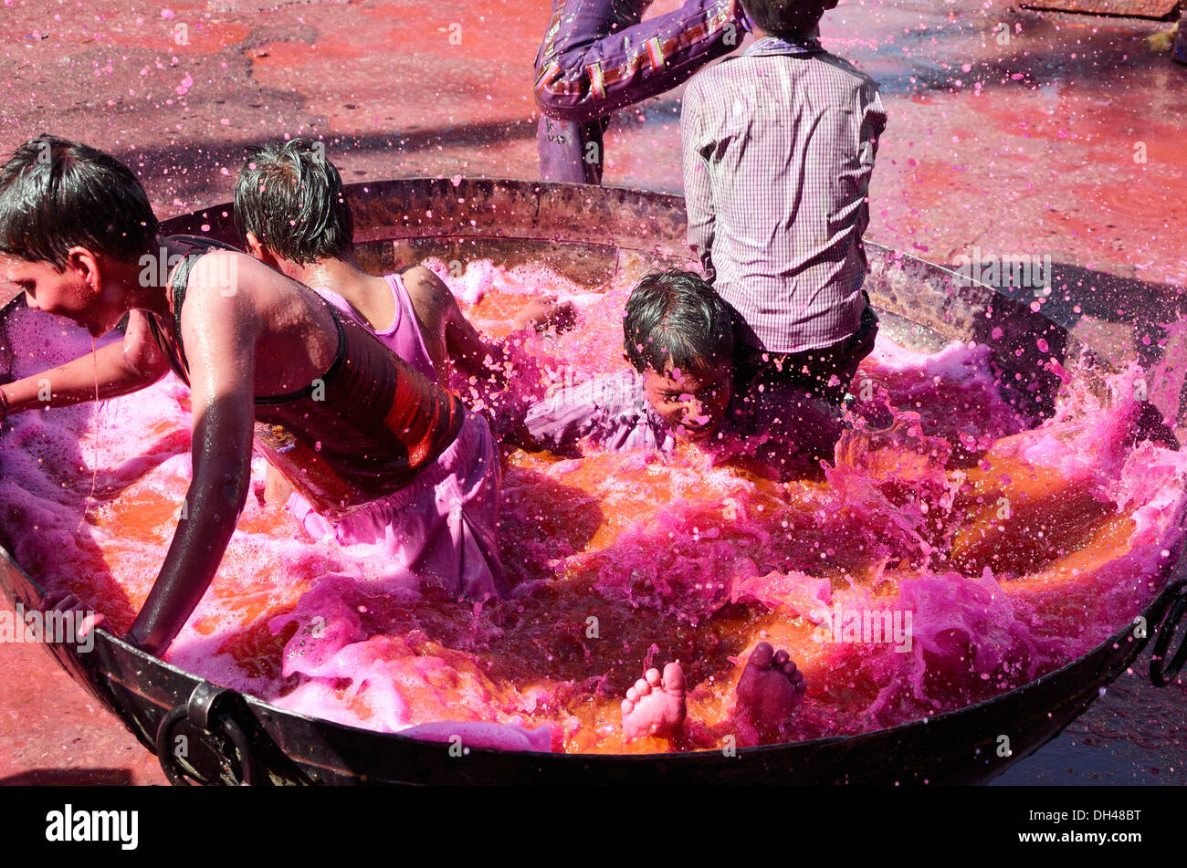 Boys enjoying colourful water Holi festival Rajasthan India Asia Stock ...