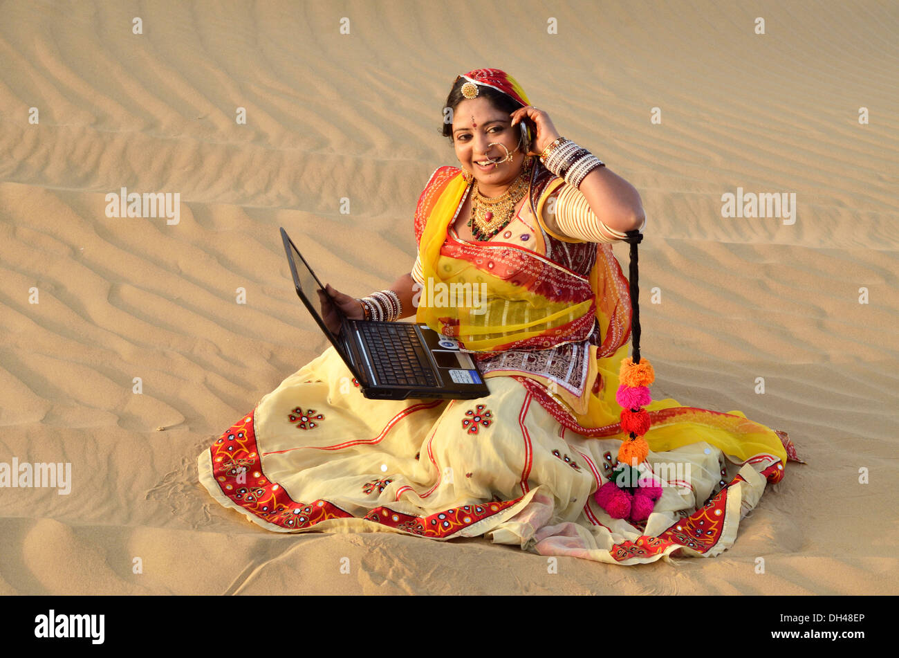 Indian rajasthani woman camera in hi-res stock photography and images ...