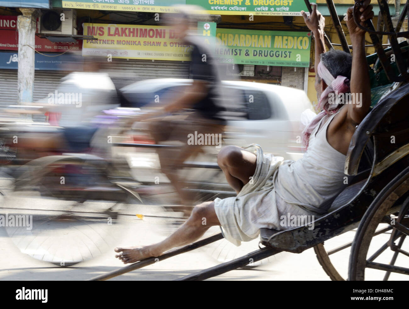 Hand rickshaw puller rest hi-res stock photography and images - Alamy