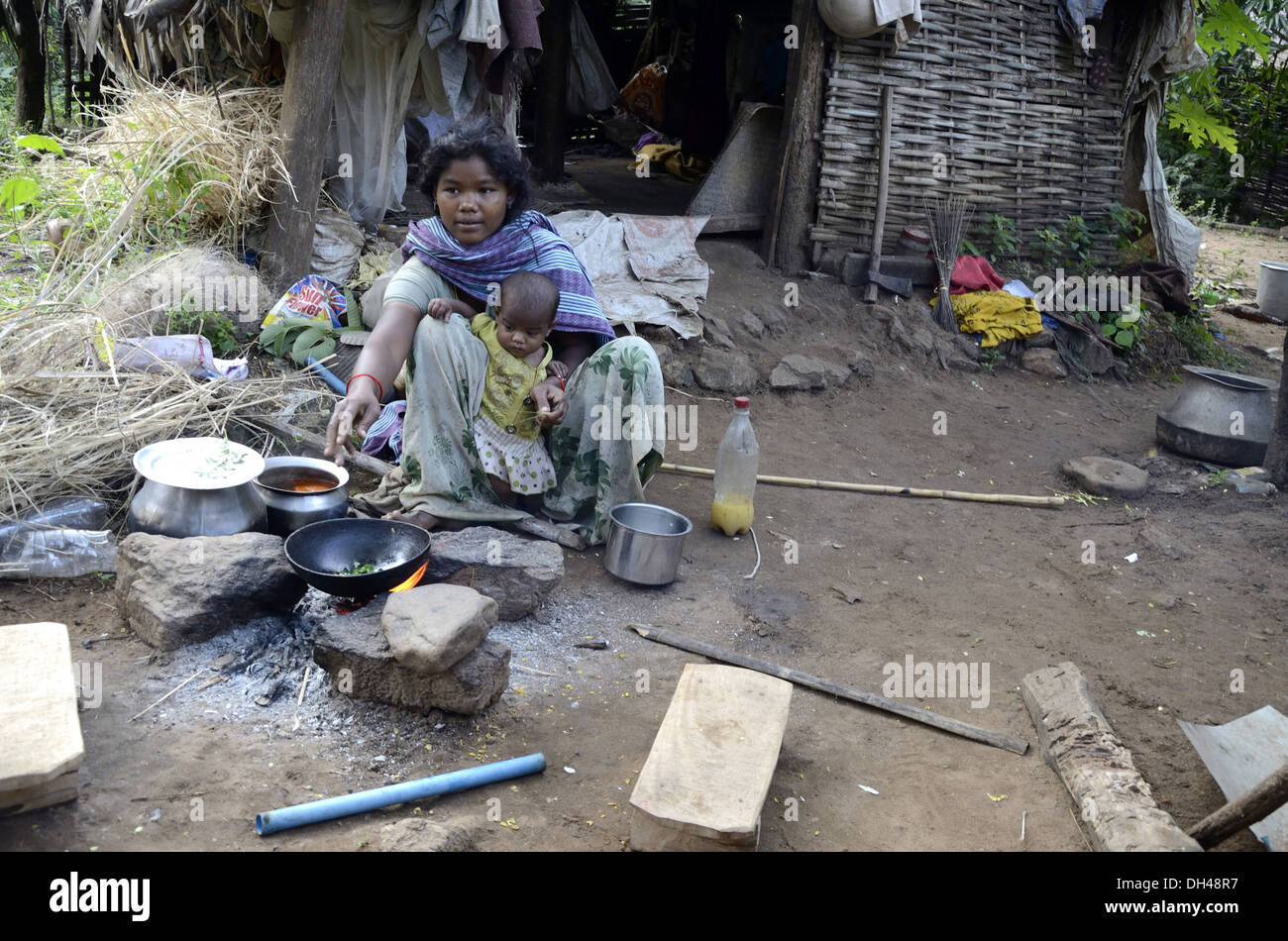Indian tribals cooking hi-res stock photography and images - Alamy