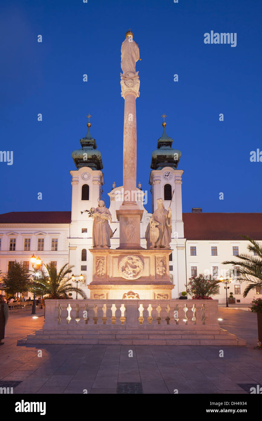 Church of St Ignatius Loyola and Trinity Column at dusk, Gyor, Western ...