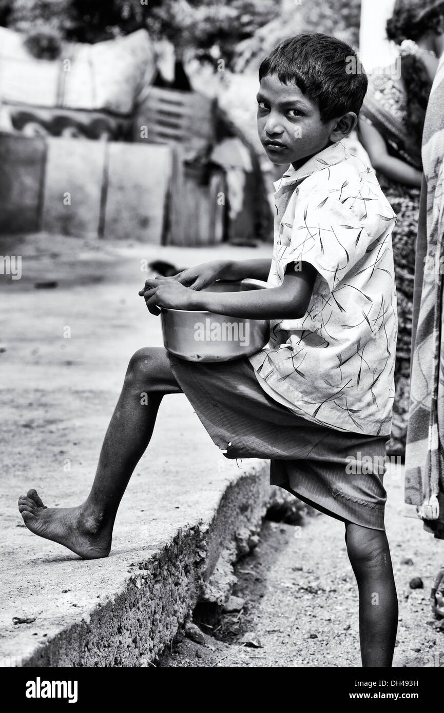 Child begging hi-res stock photography and images - Alamy